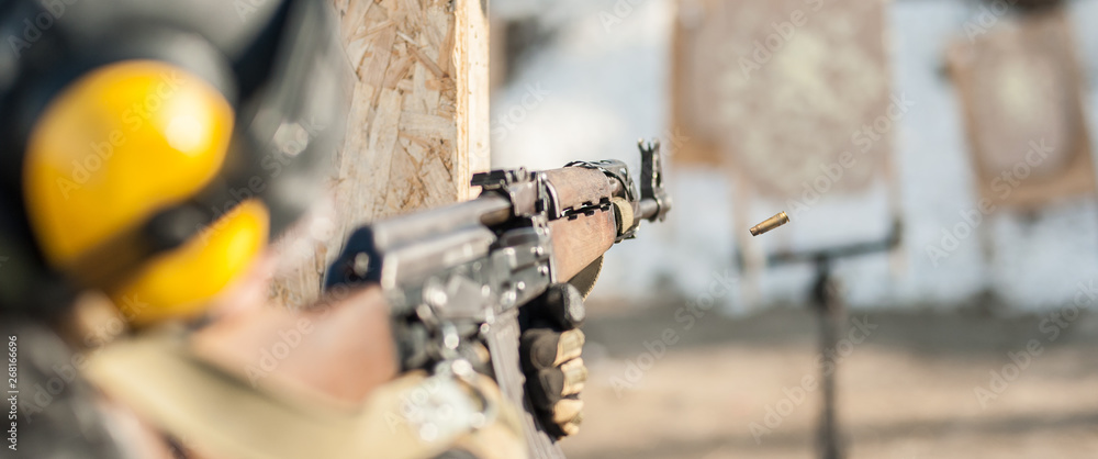 Special forces soldier in action, shooting from rifle machine gun Stock ...