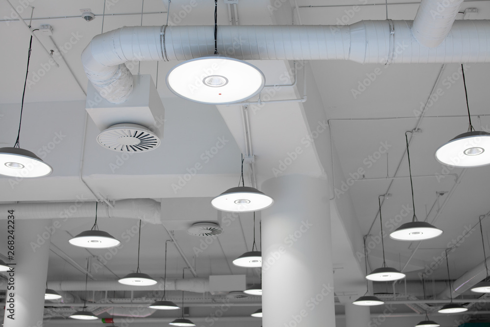 Shopping center led lighting. Ceiling lights in the mall. Ventilation ...