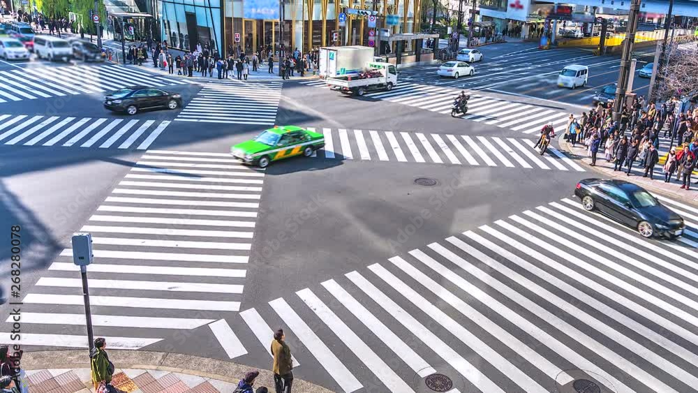 4K,Time lapse traffic and crowd people at ginza district intersection ...