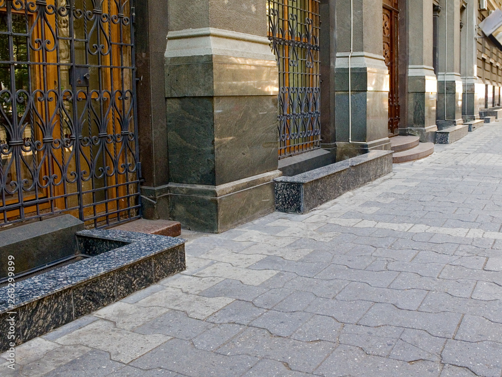 textured street wall. Facade of the house of a city street Background ...