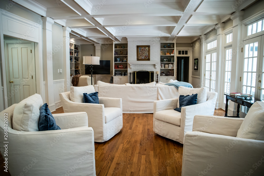 Large Living Room Den in Home with Vaulted Tray Ceiling and bookshelves ...