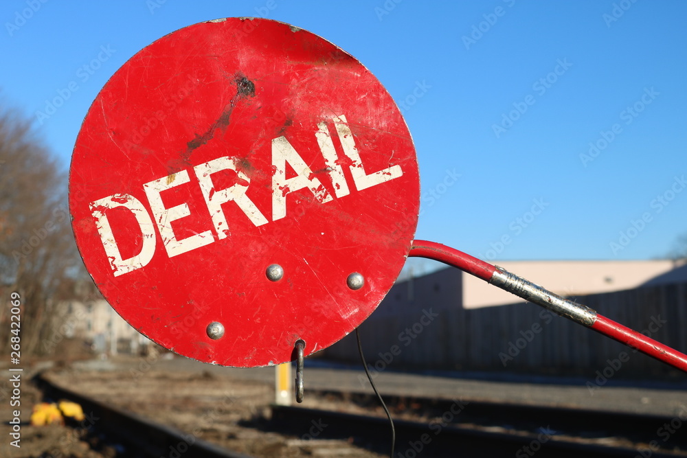 Red derail warning symbol sign on old abandoned railroad tracks foto de ...