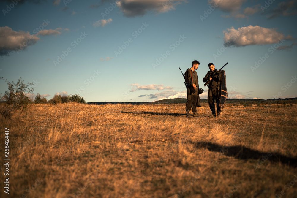 HunterS with shotgun gun on hunt. Calibers of hunting rifles. HunterS ...