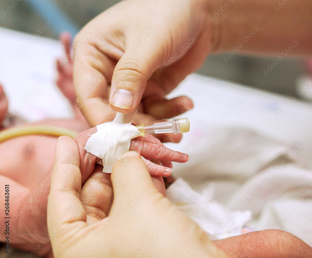 Nurse hands using medical adhesive plaster stick and wrap safely on IV ...
