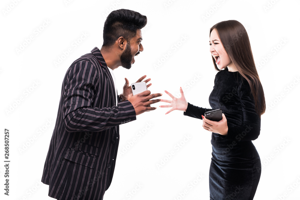 Angry Asian Couple Shouting At Each Other On White Background Stock