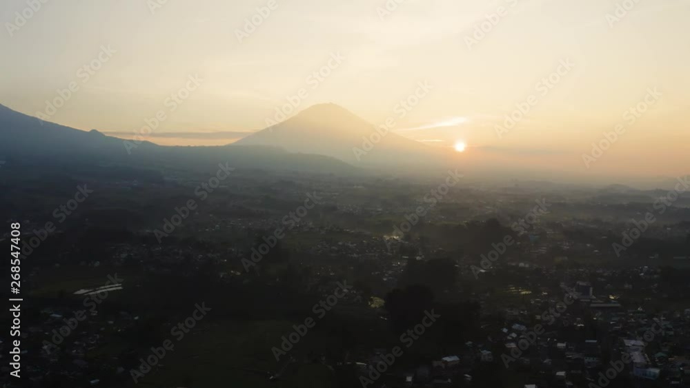 Beautiful aerial view of sunrise with mountain background and suburban ...