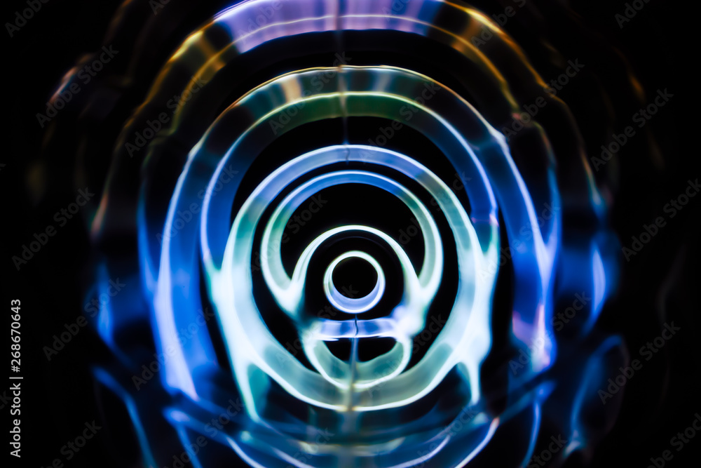 Sound waves in the dark in full color Stock Photo | Adobe Stock