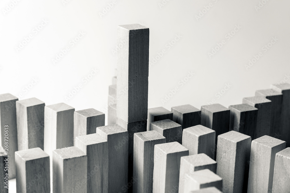 Many curved lines of wooden cubes are connected in the center into one ...