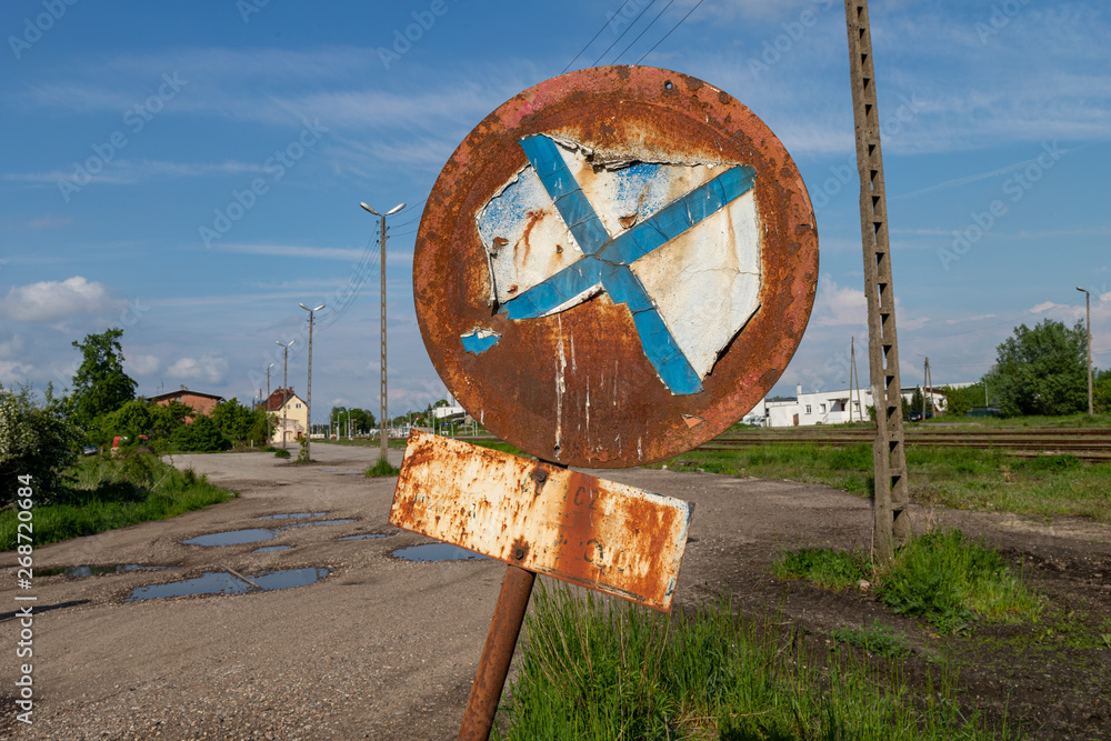 Old rusty sign prohibiting stopping and stopping. Marking on an old ...