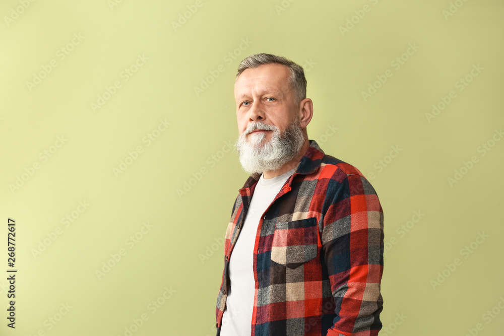 Portrait of handsome senior man on color background Stock Photo | Adobe ...