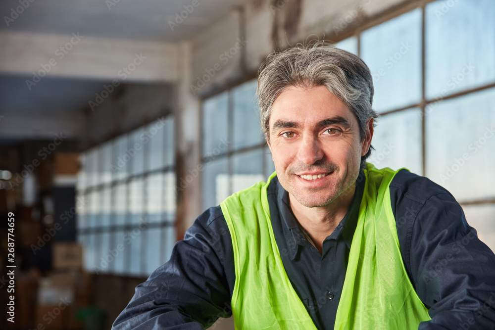 Junger Mann als Industrie Arbeiter Stock Photo | Adobe Stock