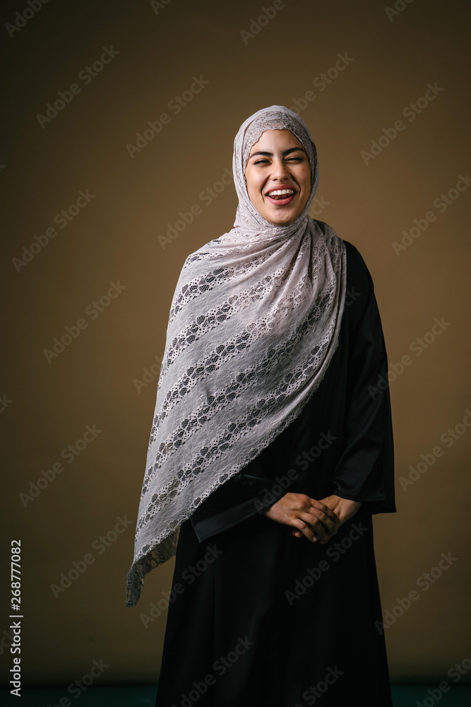 Portrait of a tall, slim and elegant Muslim Middle Eastern woman in a ...