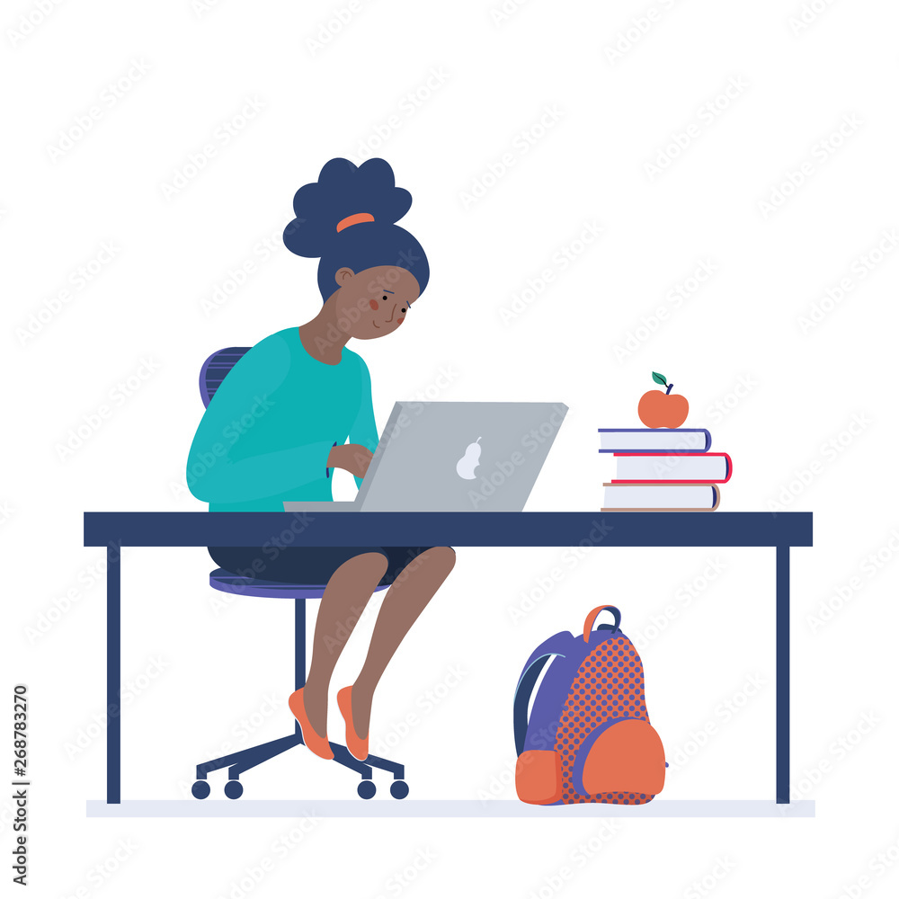 Teenage African American black girl working on laptop, coding, learning ...