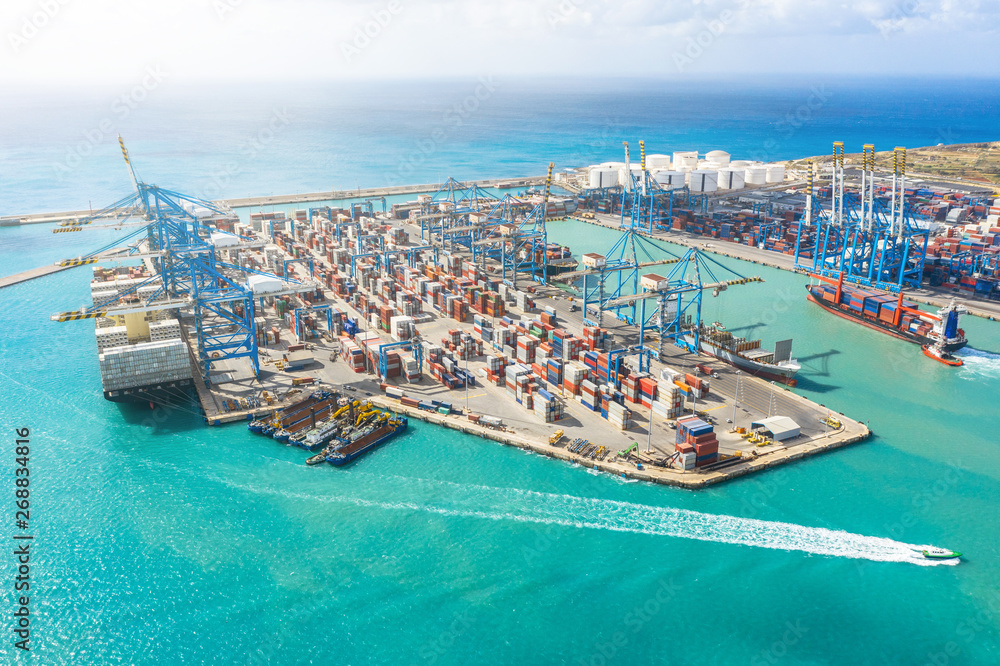 Aerial view of the sea cargo port with a huge number of containers ...