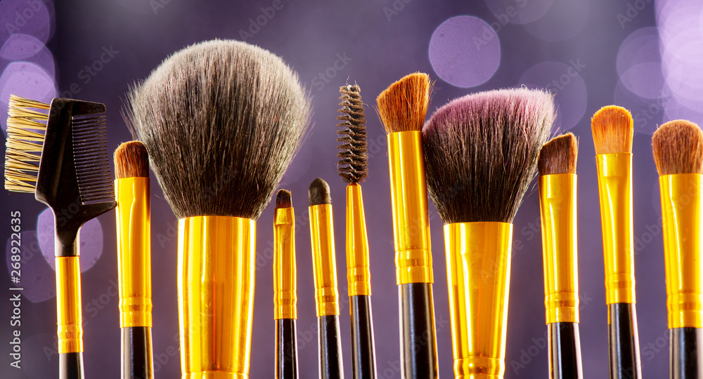 Makeup brushes set over black holiday blinking background. Various ...