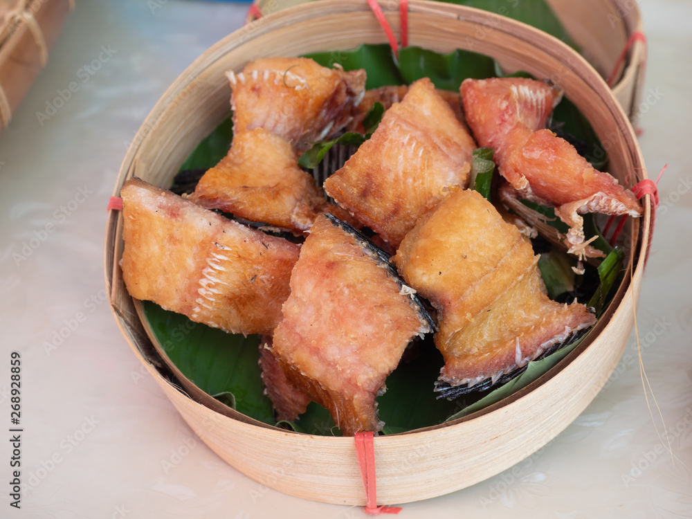 Dried striped snakehead fish or Channa striata fried and put in the ...