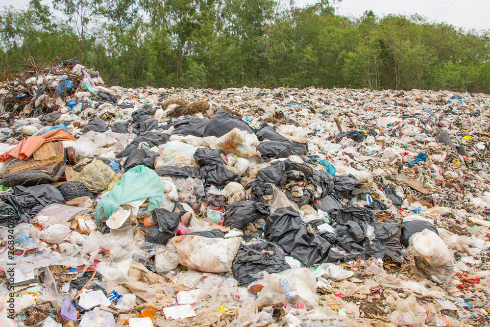 garbage dump pile in trash dump or landfill,truck is dumping the gabage ...