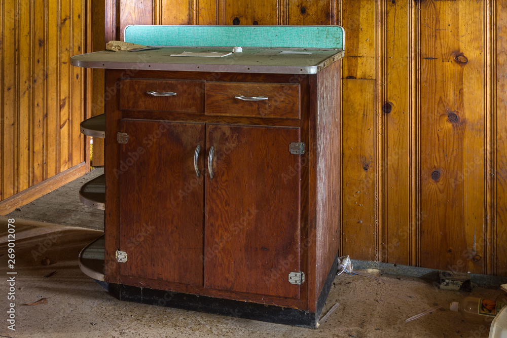 Old kitchen counter with cabinets left abandoned in an old home Stock ...