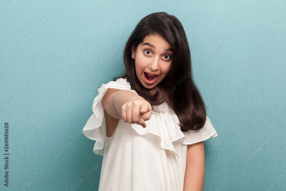 Portrait of shocked beautiful brunette young girl with black long ...
