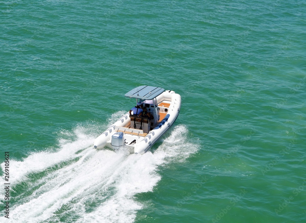 Man Motorboating A Woman