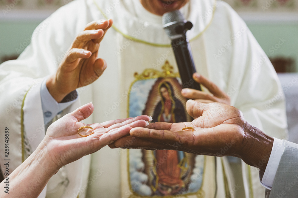 Religious moment of the exchange of alliances during the marriage in ...