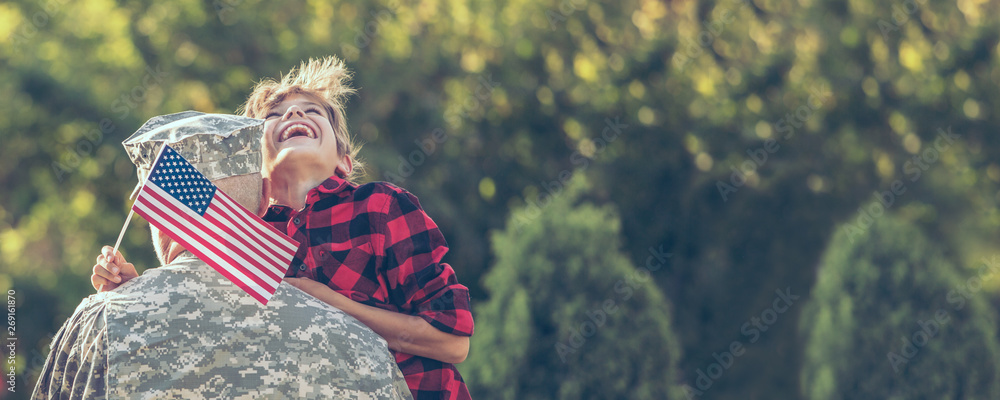 Happy reunion of soldier with family outdoors Stock Photo | Adobe Stock