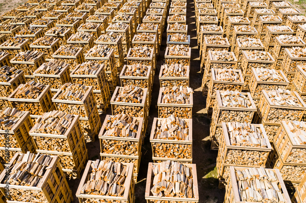Rows of firewood stacked on pallets seen from above Stock Photo | Adobe ...