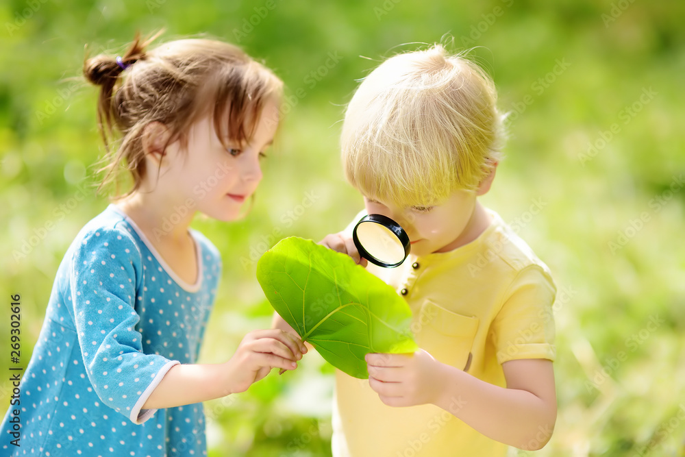 Kid Looking Through Magnifying Glass