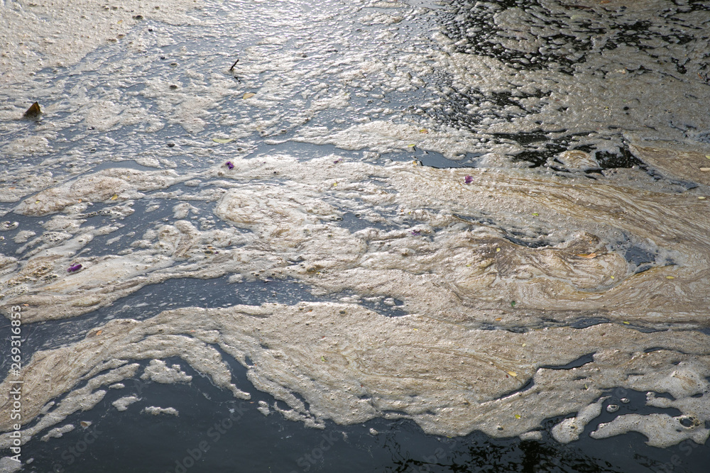 Polluted water surface with different colored patches Stock Photo ...