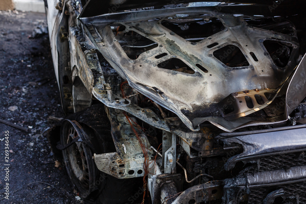 Burned car. set fire to cars in parking lot. Bandit wars, the ...