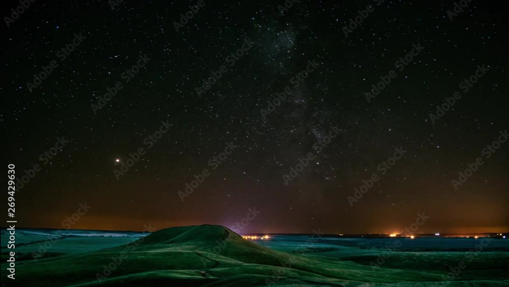 Milky way, Mars and Perseids meteor shower in clear night sky in front ...