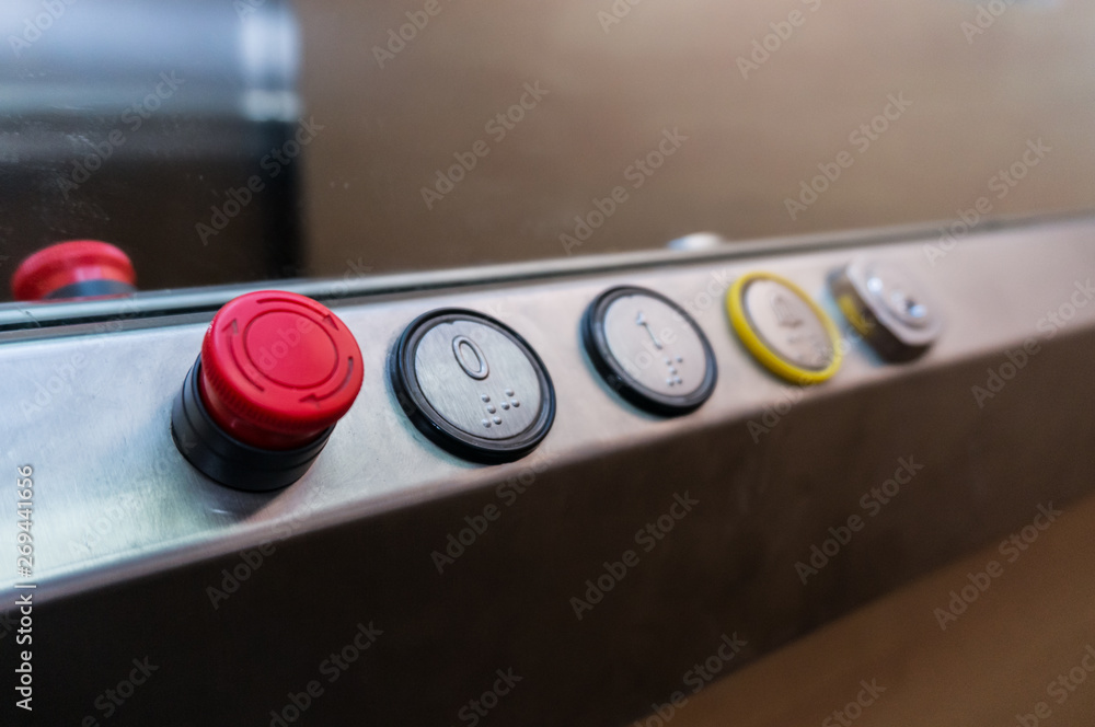 Emergency stop button of an elevator Stock Photo | Adobe Stock