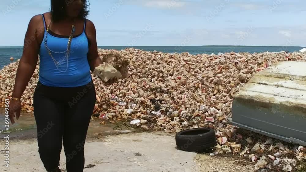 The Original Bahama Mama Holding Conch Shell, Conch Shell Palace, West ... The Original Bahama Mama Holding Conch Shell, Conch Shell Palace, West ...