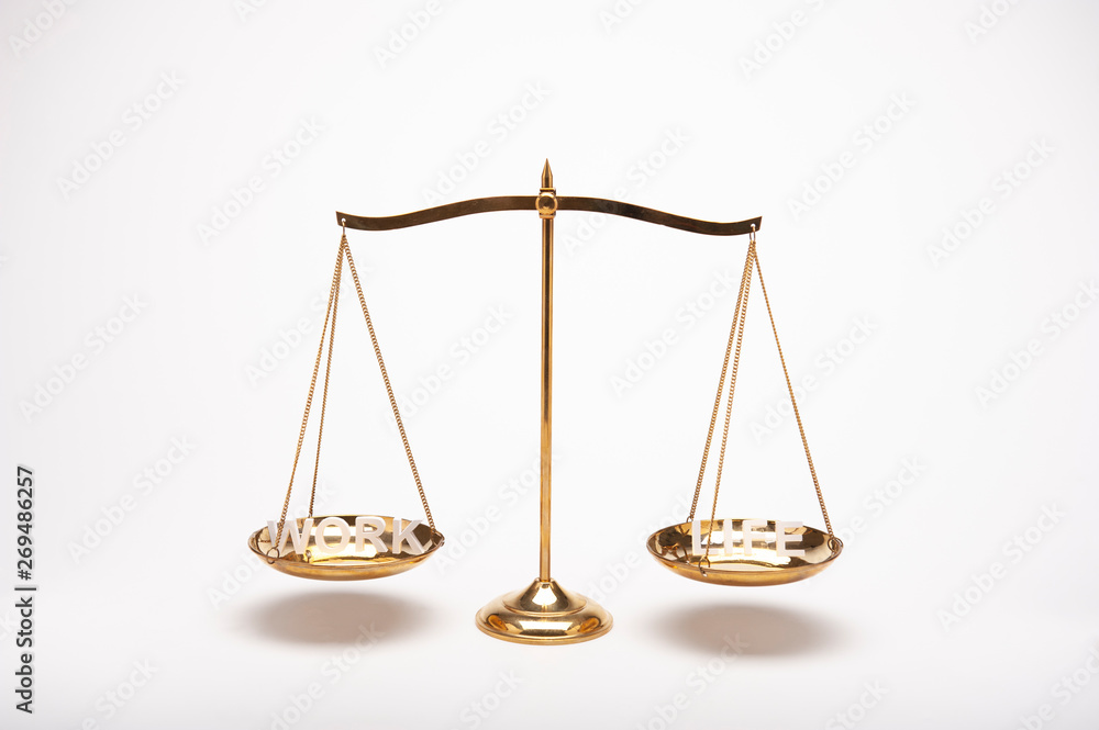 Gold brass balance scale on wooden desk and white backdrop Stock Photo ...