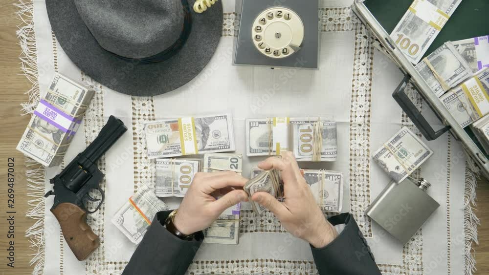 Old time gangster counting stacks of money. 50's 60's 70's vintage ...