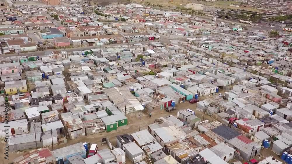 A vast informal settlement of tin shacks and low cost housing on the ...
