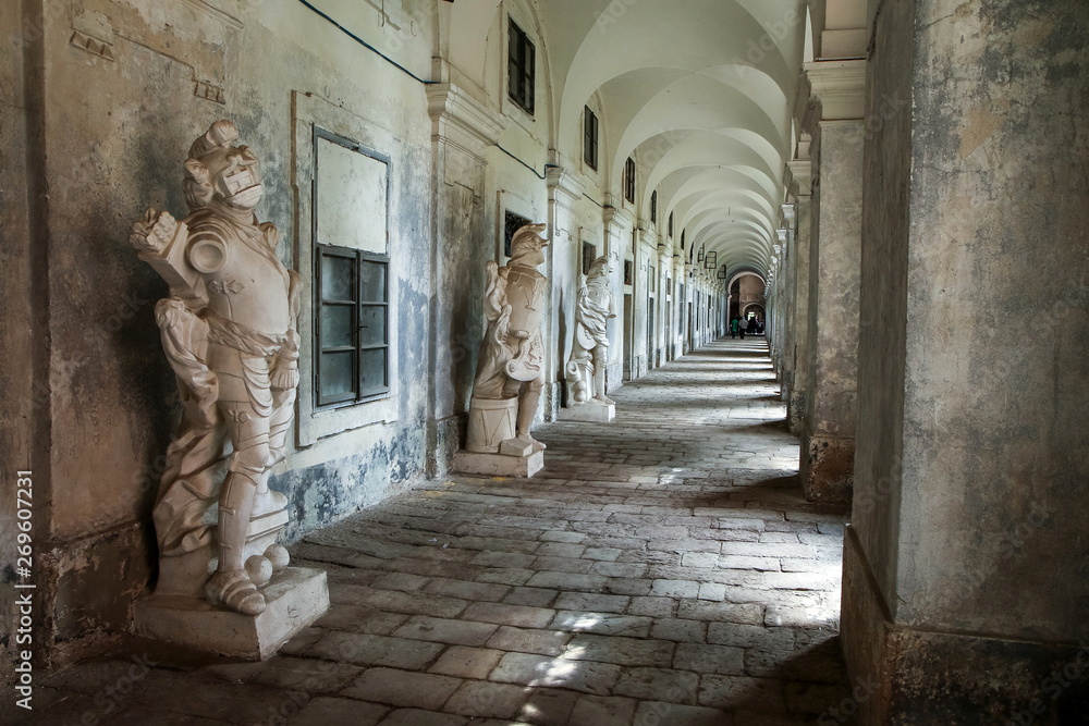 The lonely and empty corridors of the old historical building with its ...