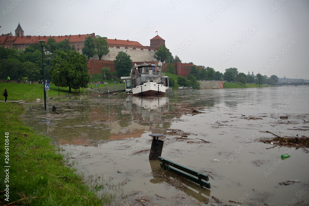 Flooding in Krakow, Poland, Vistula river, its embankments under dirty ...