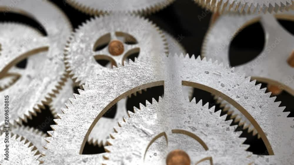 Vidéo Stock camera moves along the rotating gears and focuses on the ...