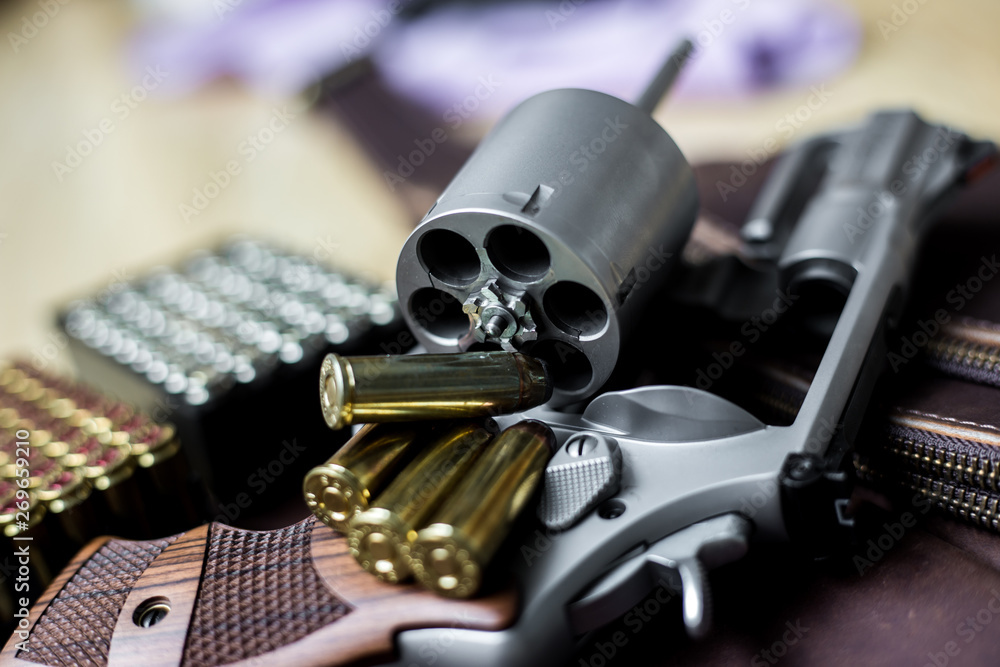.44 magnum revolver handgun with bullet Stock Photo | Adobe Stock