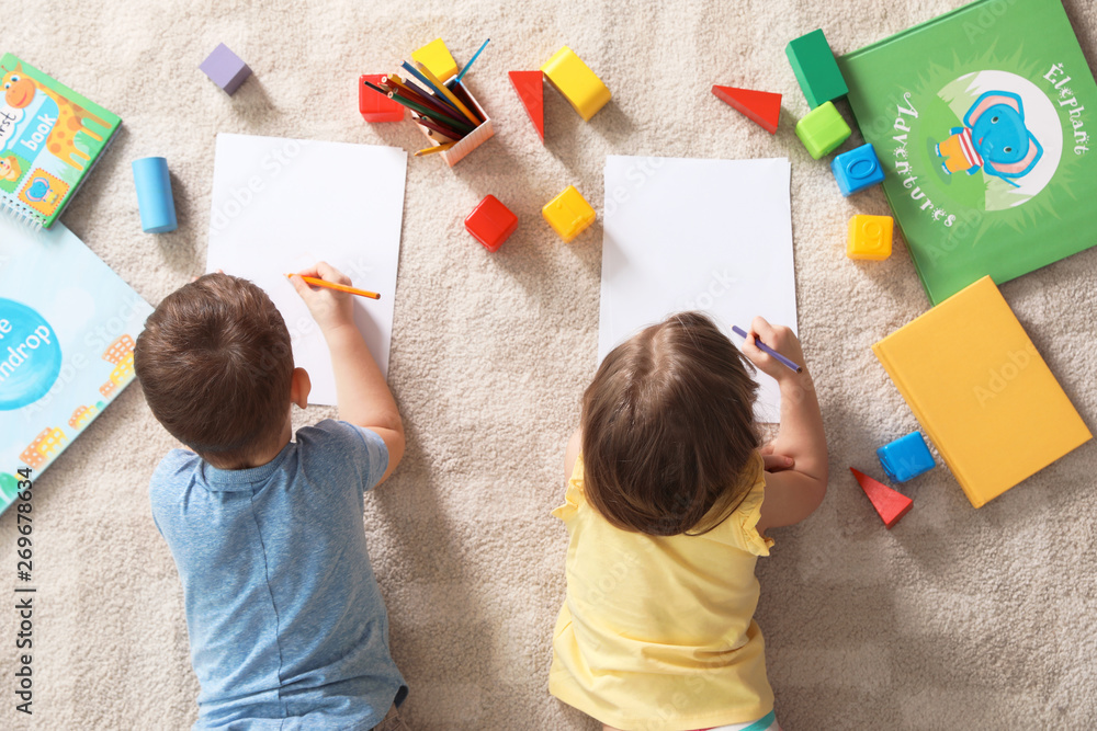 Little children drawing indoors, top view. Learning and playing Stock ...