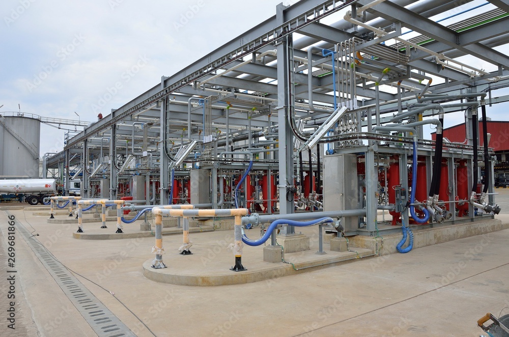 Loading tank trucks technology on the terminal Stock Photo | Adobe Stock