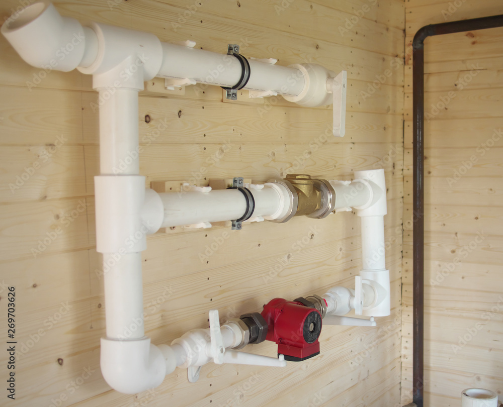 mounting of gravity heating system equipment with laser level in a ...