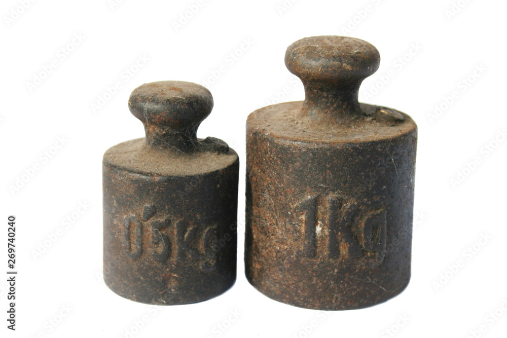 Half kg and 1 kg weights for retro scales at the white background Stock ...