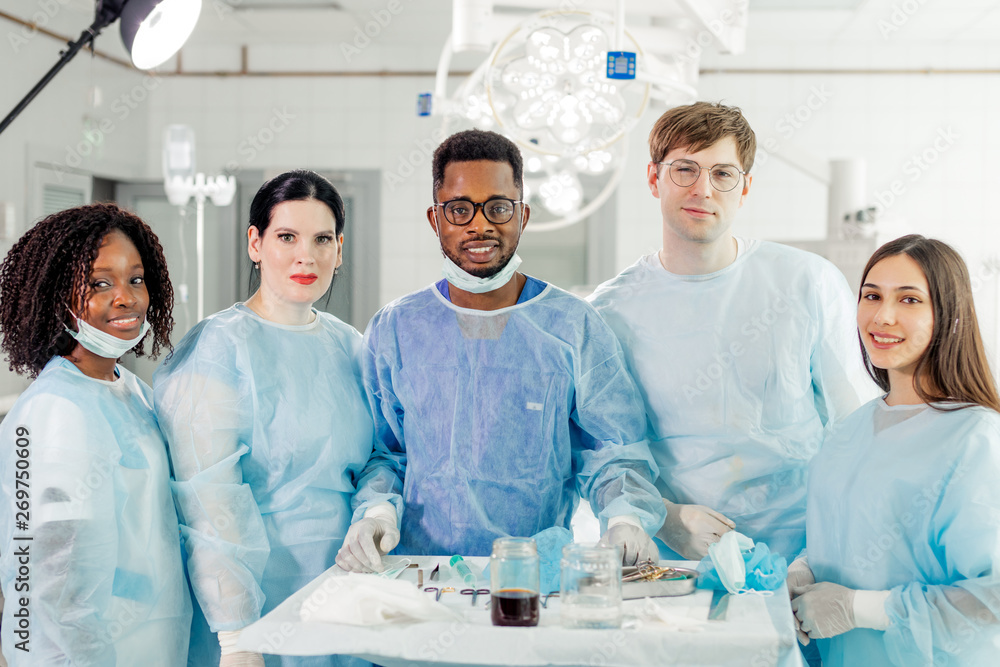 Group of talented multiracial doctors and nurses in a hospital. close ...
