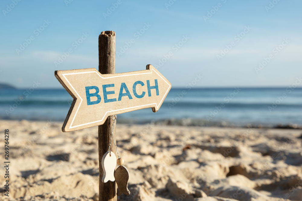 Beach Directional Sign Pole On Sandy Beach Stock Photo | Adobe Stock
