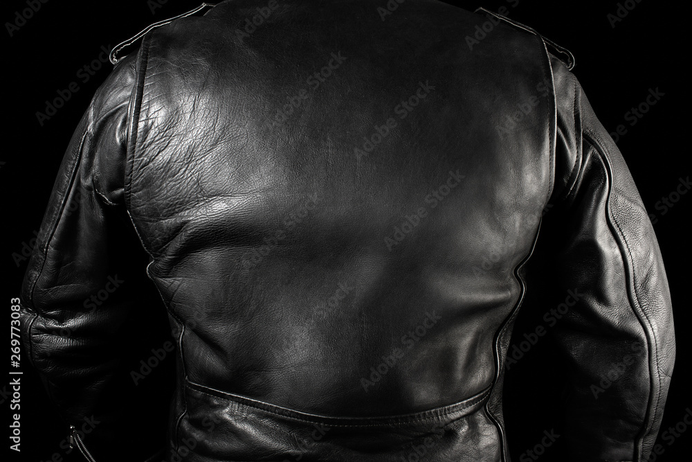 Biker man in leather jacket on street back view. Stock Photo | Adobe Stock