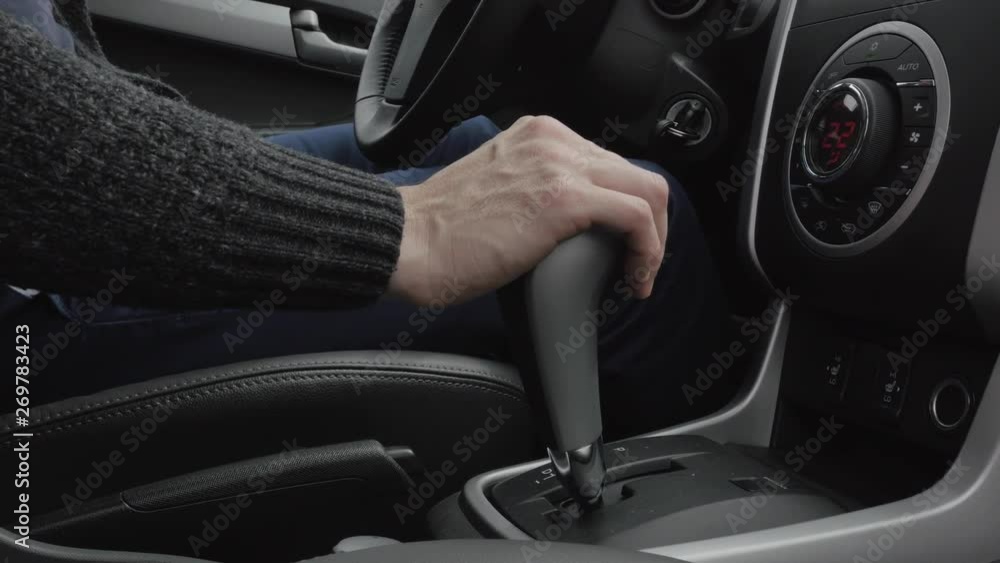 Video Stock Urban man using transmission and taking steering wheel. Man ...
