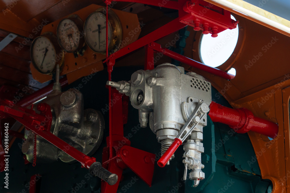 Closeup control valve of steam locomotive. Directional valves allow ...