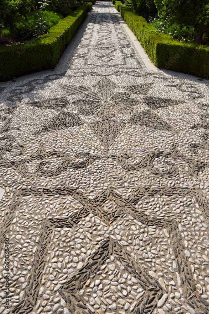 Stone pattern in garden walkway of San Francisco convent at Alhambra ...